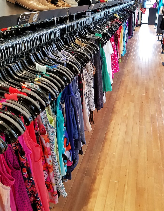 Organized by size and style, these racks aren't just clothing—they're a rainbow road map to your next "Where did you get that?" conversation starter.