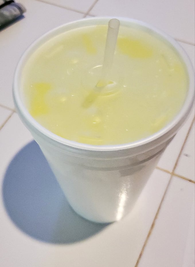 This isn't your grandkid's lemonade stand product—it's the real deal, looking like liquid sunshine in a styrofoam chalice of refreshment.