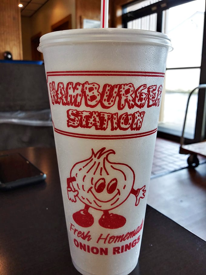 Their cup doesn't just hold a drink; it's a mascot-adorned promise of freshness. That little onion guy knows what's up.