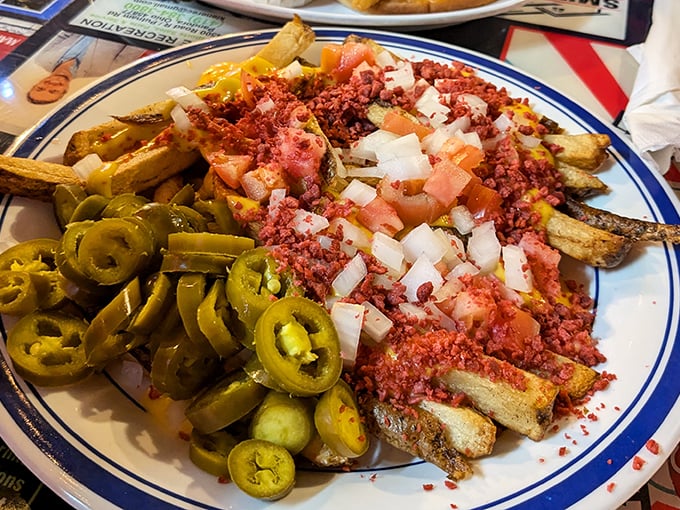 Loaded fries that don't mess around—jalapeños, corned beef, and cheese create a masterpiece that's less side dish and more "the reason you'll need a nap afterward."