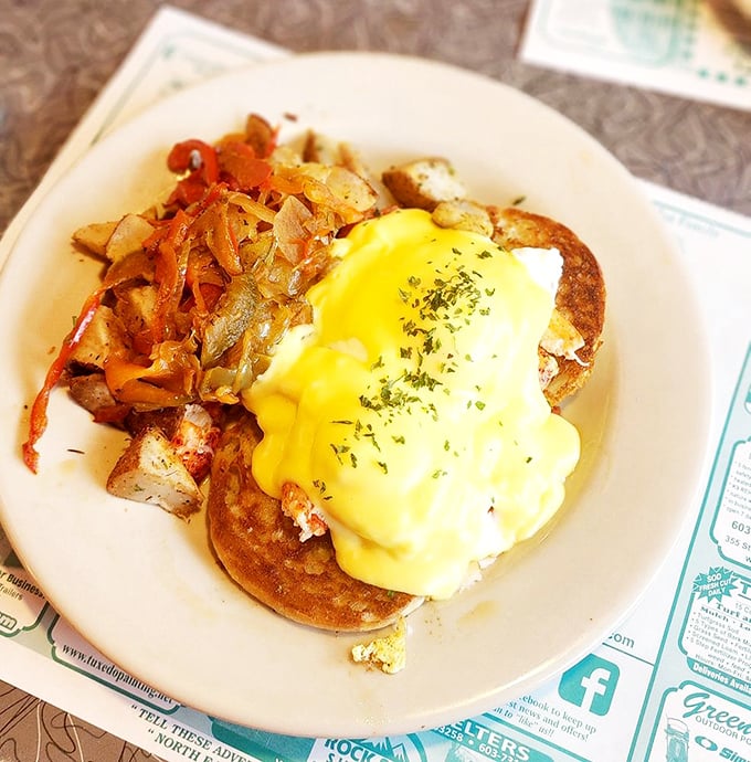Breakfast elevated to an art form—golden pancakes crowned with hollandaise, a celebration of morning indulgence that would make brunch royalty jealous.