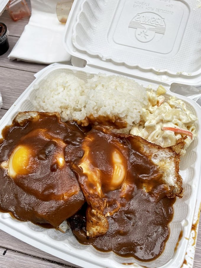Comfort food that speaks a universal language—a loco moco that wraps you in a warm, gravy-soaked hug of culinary nostalgia.