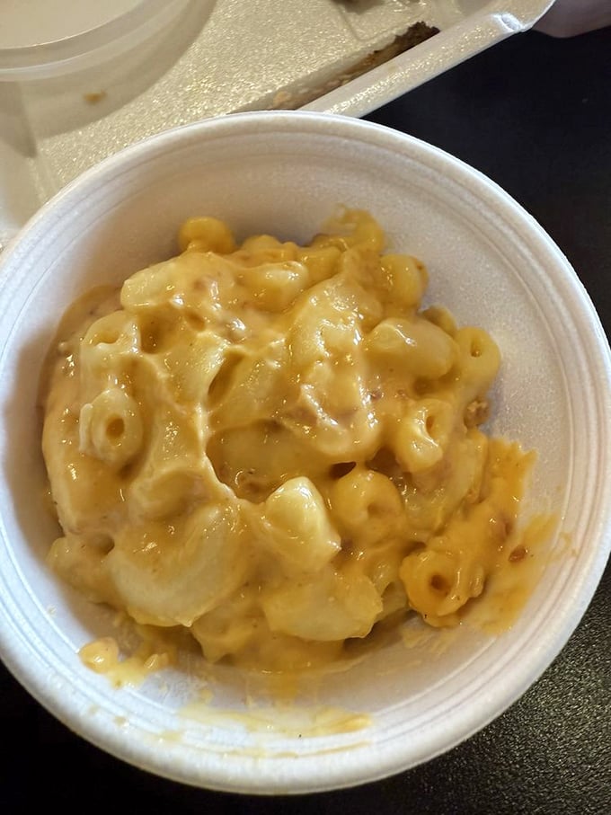 Mac and cheese that would make your childhood self high-five your adult self. This isn't that neon orange stuff from a box—this is the real, creamy deal.