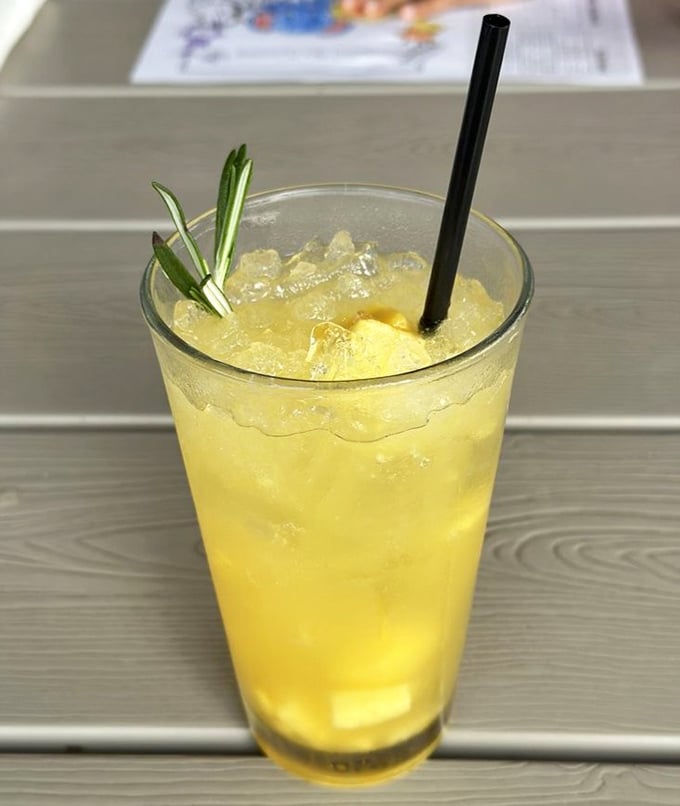 This sunny spritz garnished with fresh rosemary isn't just a drink—it's liquid sunshine in Lancaster County.