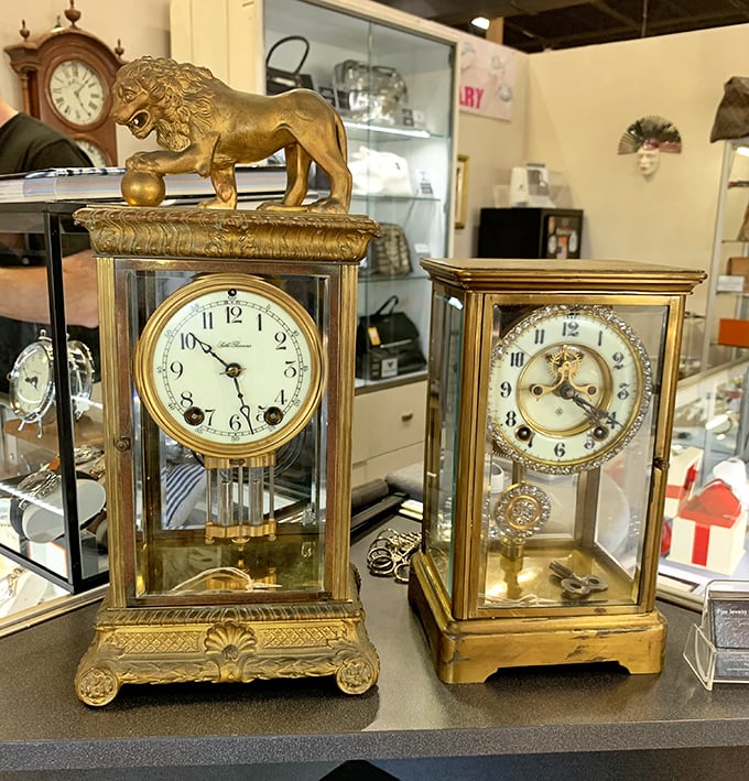 These ornate mantel clocks don't just tell time—they tell stories. That lion isn't just decorative; he's guarding hours of craftsmanship.