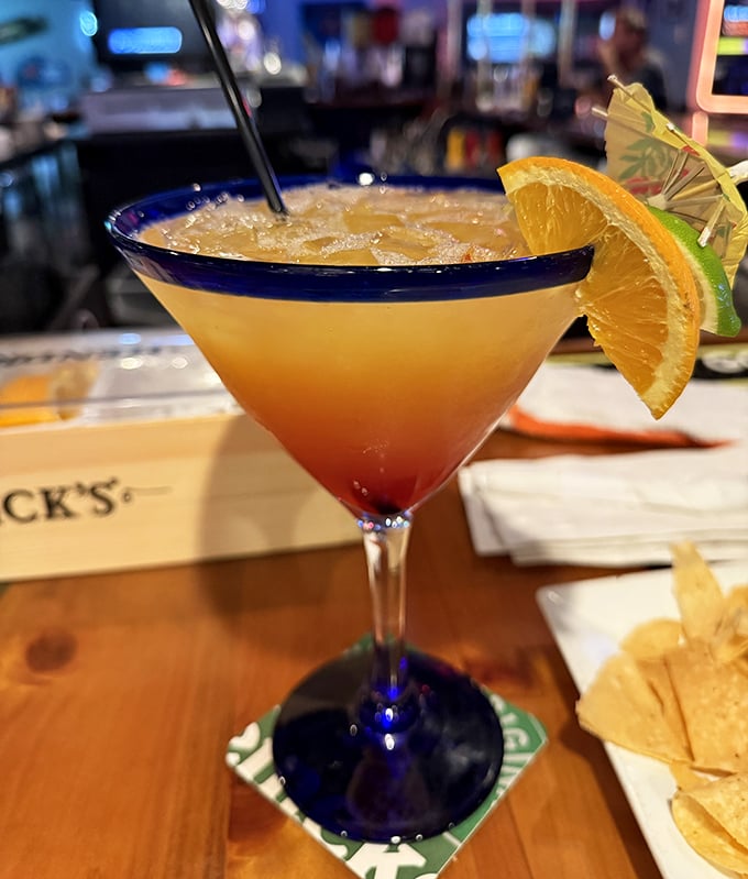 A sunset in a glass—this tropical cocktail delivers Florida vacation vibes even if you're just stopping in after work on a Tuesday.