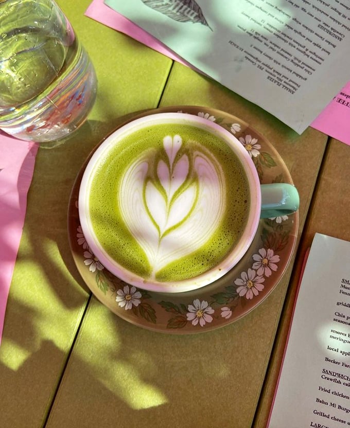 This matcha latte isn't just a drink—it's a leafy green masterpiece with latte art so pretty you almost feel guilty disturbing its surface. Almost.
