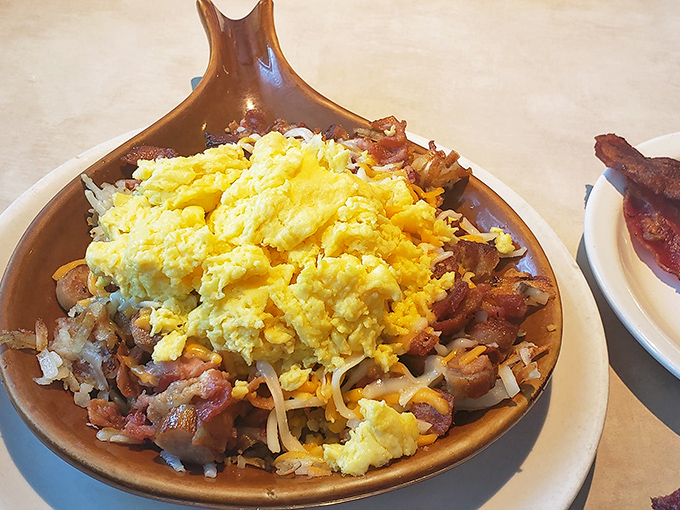 This skillet doesn't just contain breakfast—it contains multitudes of flavor, with eggs playing king of the mountain.