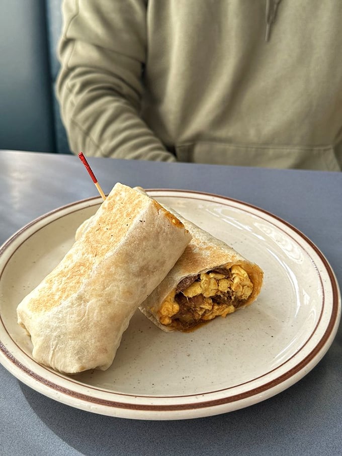 This burrito isn't just wrapped—it's lovingly tucked in like a food baby, with eggs and potatoes nestled inside that perfectly griddled tortilla.