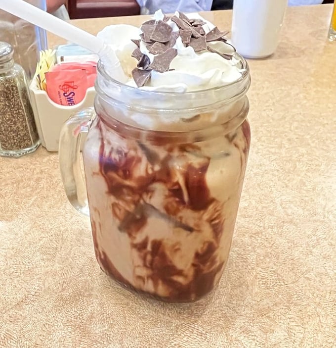 Their specialty coffee drinks arrive in mason jars like liquid desserts—where caffeine meets indulgence in a relationship your doctor wouldn't approve of.