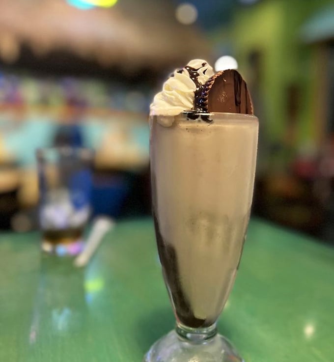 Their milkshakes don't just bring folks to the yard – they're topped with enough whipped cream to qualify as structural engineering.