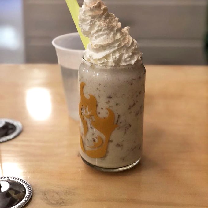 This isn't just a milkshake—it's dessert architecture with a straw. The perfect cool counterpoint to all that chicken heat.