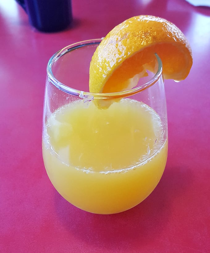 Morning mimosas sparkle with promise – liquid sunshine in a glass that whispers, "You're on vacation, even if you're not."