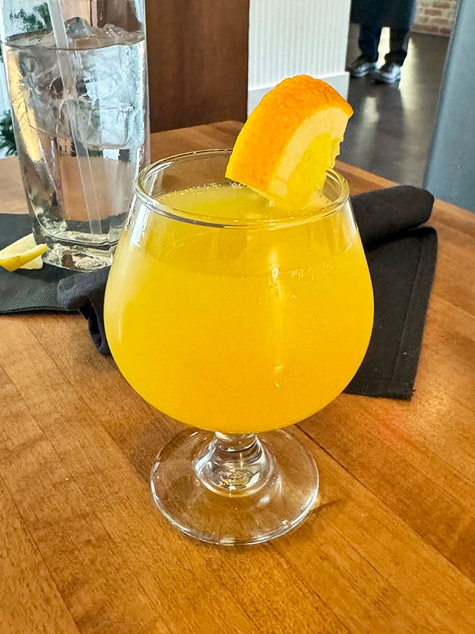 Sunshine in a glass! This vibrant mimosa brings weekend brunch energy to any day of the week with its perfect balance of bubbly and citrus.