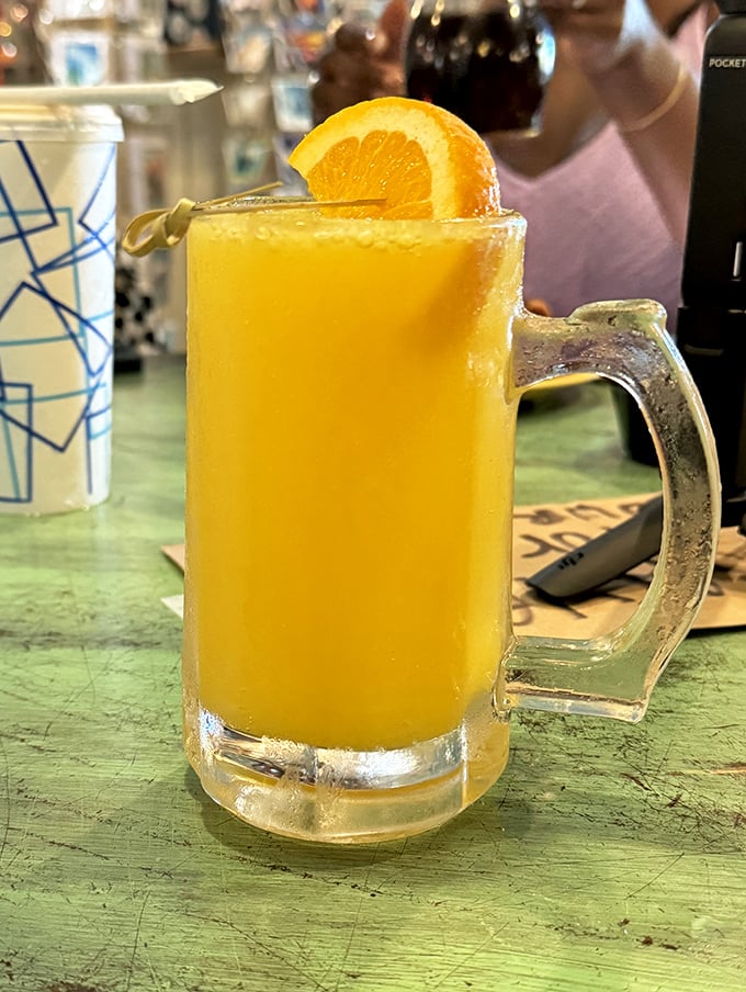 A mimosa in a frosty mug is the breakfast equivalent of finding an extra $20 in your pocket—unexpected joy in liquid form.