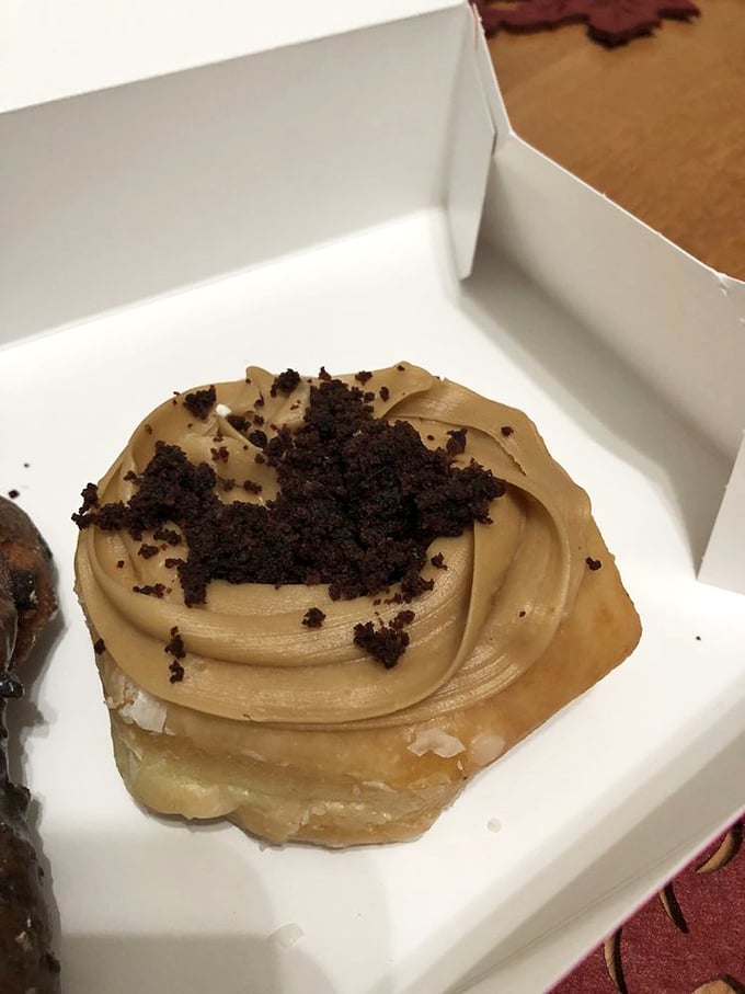 This chocolate-pecan masterpiece isn't just a donut—it's therapy with nuts. The perfect balance of crunch and softness in every bite.