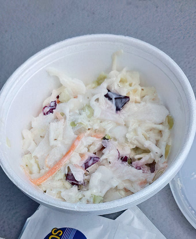 Mom's coleslaw—the unsung hero of any barbecue plate. Crisp, creamy, and the perfect cool counterpoint to all that smoky meat.
