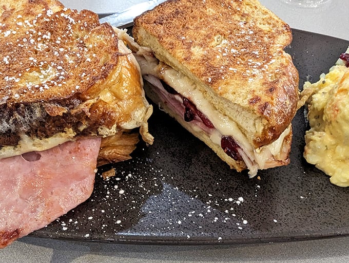 The Monte Cristo sandwich achieves the perfect balance between sweet and savory breakfast indulgence.