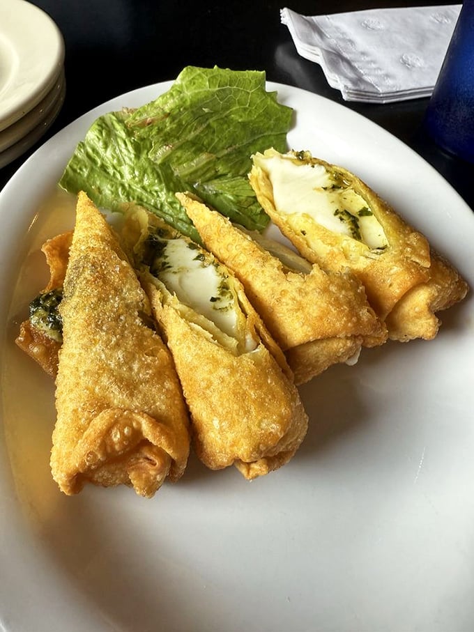 These aren't your average mozzarella sticks—they're wontons filled with melty cheese that make you question why this isn't standard everywhere.