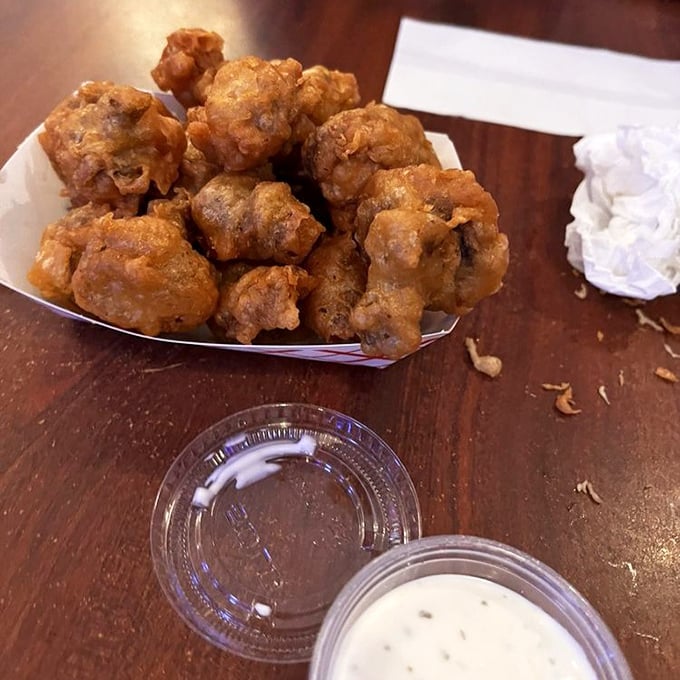 These mushrooms aren't trying to be healthy—they've fully embraced their deep-fried destiny, and we should all be thankful they did.