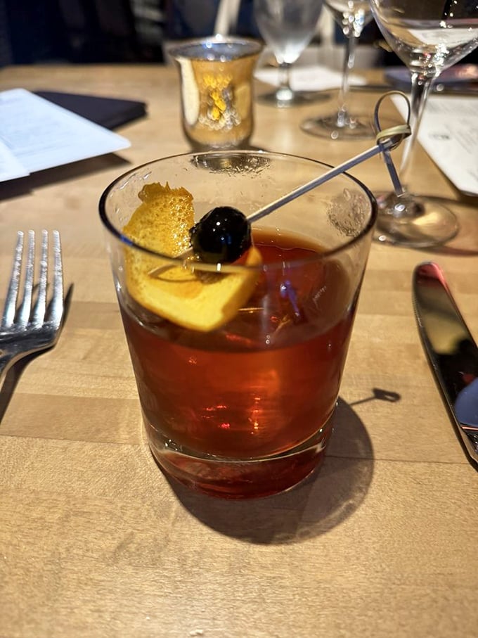 An Old Fashioned that Don Draper would approve of—perfectly balanced, elegantly garnished, and guaranteed to make dinner conversation more interesting.