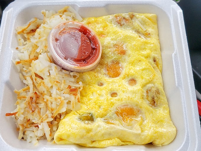 The to-go omelet box – proof that good things come in simple packages. Those hash browns are the unsung heroes of the breakfast world.