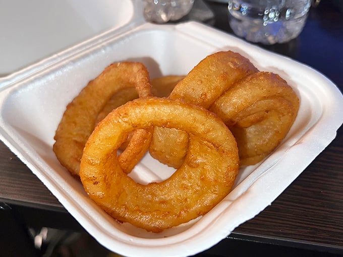 Onion rings with the structural integrity of Roman architecture. Crispy, substantial, and worth every calorie-laden bite.