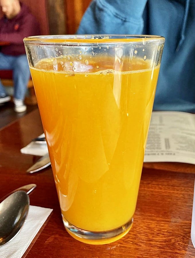 Fresh orange juice in a proper glass – not some dainty thimble, but a substantial vessel worthy of vitamin C's greatest delivery system.