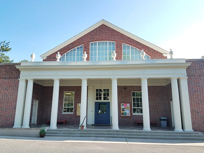 The Oxford Community Center's stately columns and brick facade house everything from art exhibits to community gatherings, proving small towns know culture.