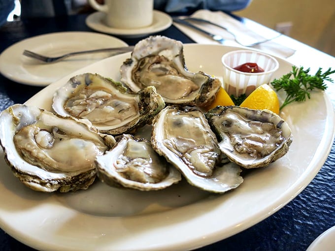 Oysters on the half shell—nature's perfect appetizer. These briny beauties need nothing more than a squeeze of lemon and perhaps a silent thank you to the sea.
