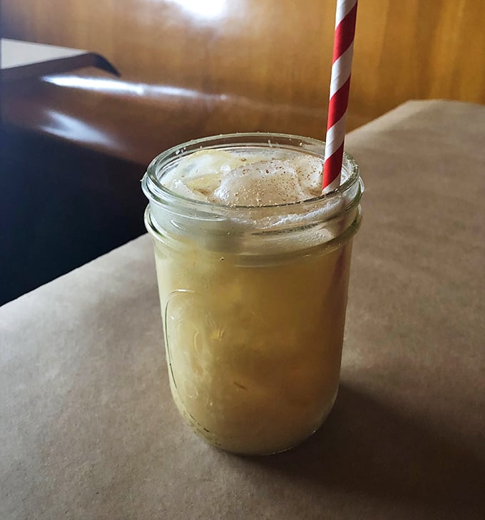 This isn't just a drink; it's vacation in a mason jar. The Painkiller cocktail lives up to its name, making Michigan winters momentarily disappear.