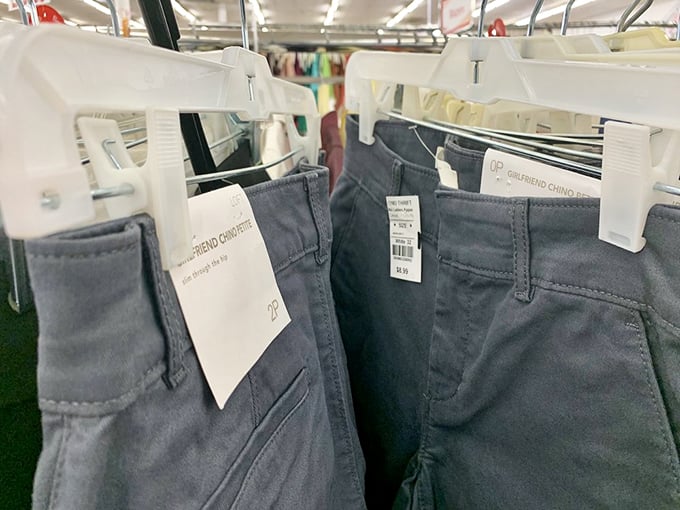 Brand new pants with tags still attached—proof that someone else's shopping regret becomes your wardrobe victory.