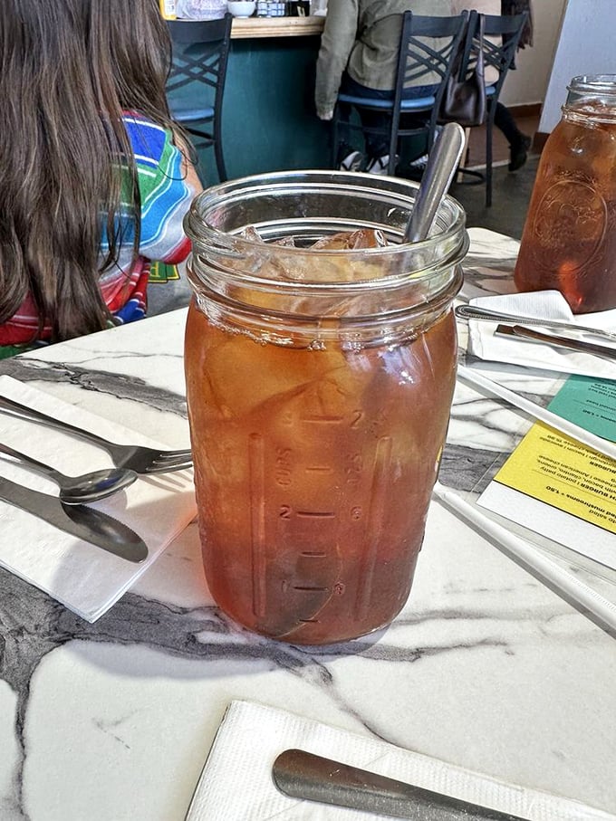 Mason jar iced tea—where Southern charm meets Gold Country hospitality in a glass that's guaranteed to need at least three refills.