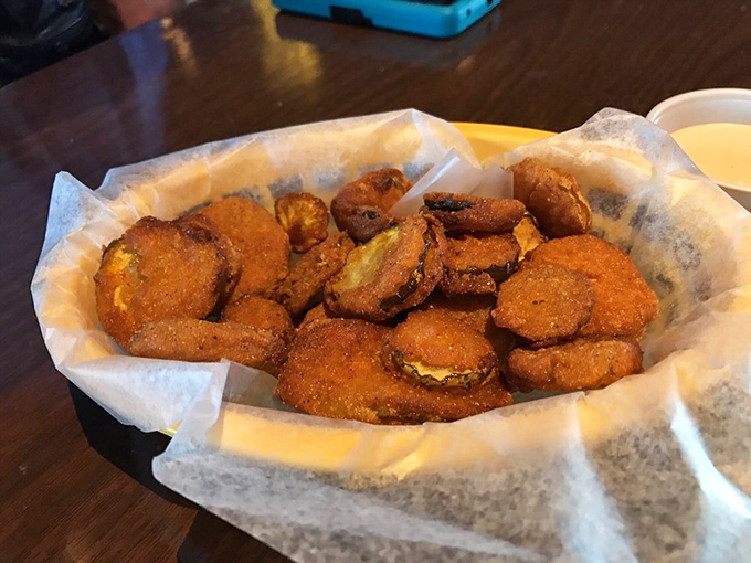 Fried pickles that deliver that perfect pucker-crunch combination. The dipping sauce is just a bonus to this addictive appetizer.