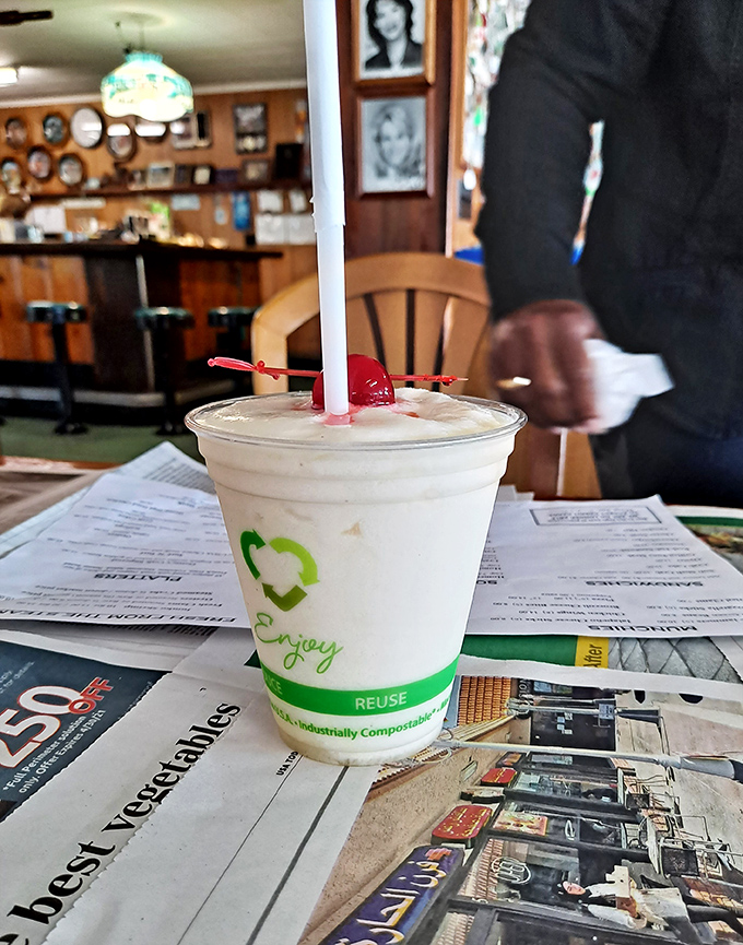 Even the drinks come with a side of coastal charm. This piña colada isn't pretending to be fancy—it's just promising a good time.