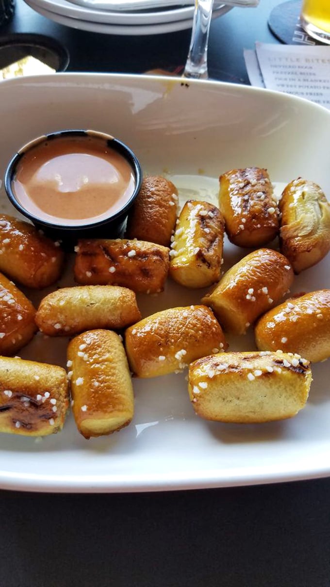 Pretzel bites with beer cheese sauce - because sometimes happiness comes in perfectly golden, bite-sized packages with salt crystals.