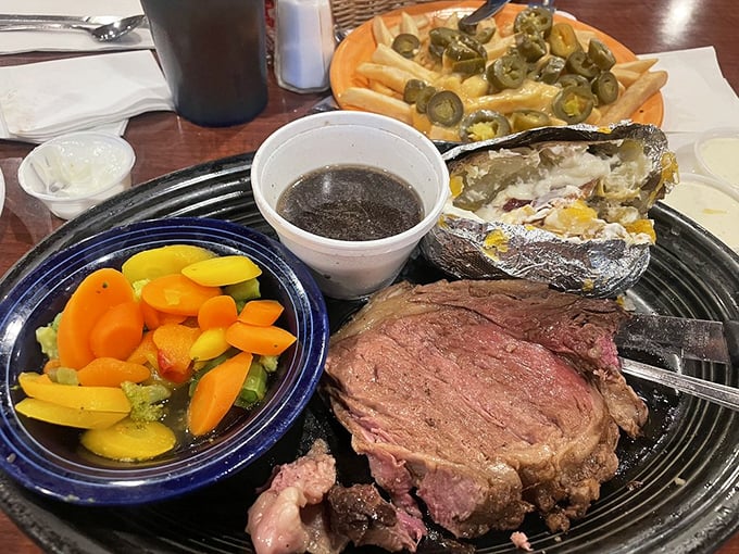 Prime rib cooked to that perfect shade of pink, with vegetables that didn't come from a freezer – a rare steakhouse victory.