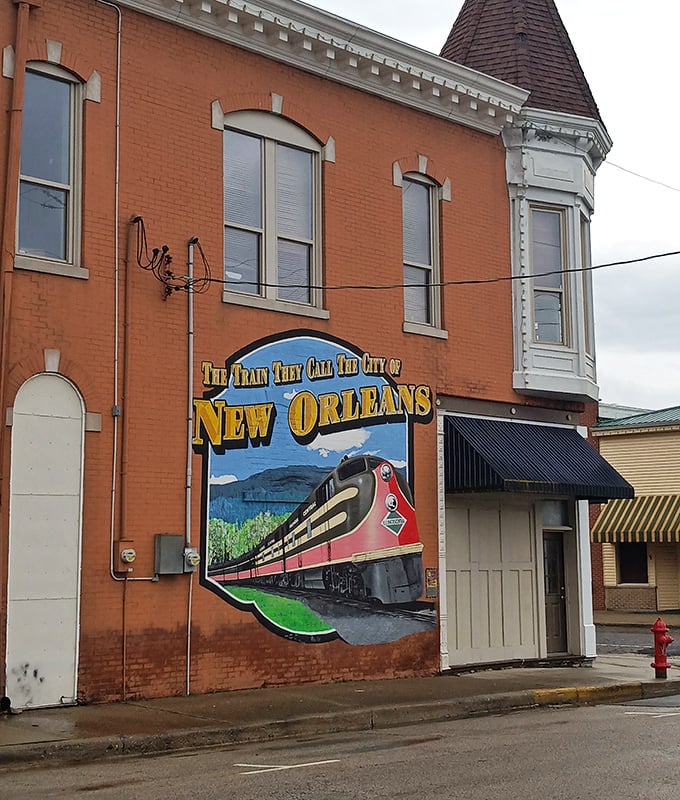 This vibrant train mural adds unexpected color to Arcola's streetscape, celebrating the railroad history that helped build this prairie town. 