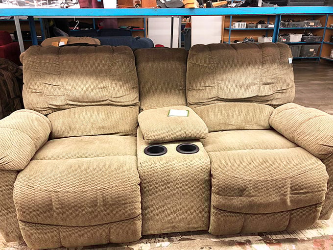 Movie night just got an upgrade. This loveseat recliner with built-in cupholders is ready for your popcorn, remote, and "just one more episode" promises.