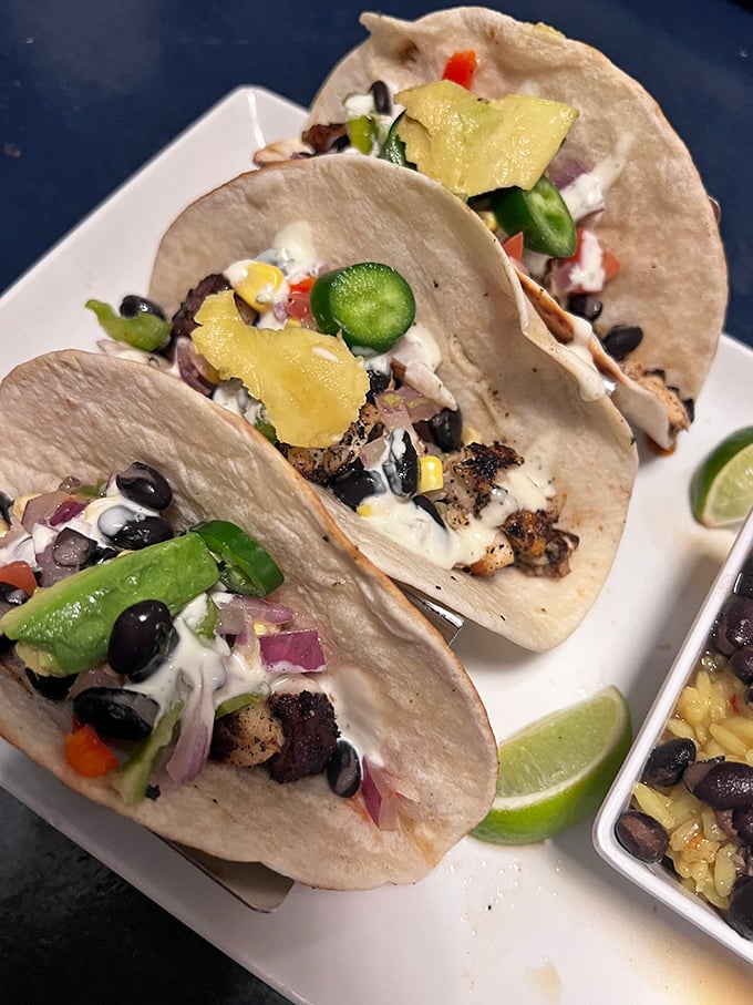 Tacos that tell a story of the sea – blackened fish nestled in soft tortillas with fresh toppings that bring the coastal vibe to your taste buds.