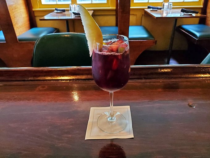 This sangria isn't just a drink—it's a vacation in a glass, complete with a pear slice life preserver. Sip slowly; paradise shouldn't be rushed.