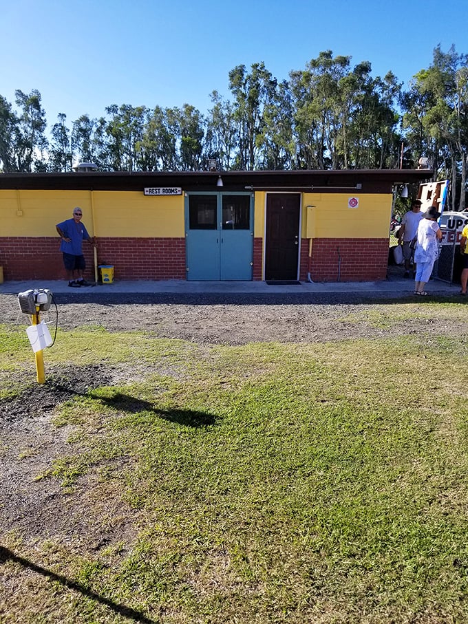 The restroom building might not win architectural awards, but it's part of the authentic drive-in experience—practical, no-nonsense, and charmingly utilitarian.