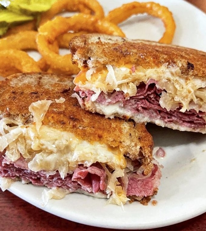 A proper Reuben should require both hands and several napkins—this beauty, with its melty cheese and sauerkraut, demands nothing less.