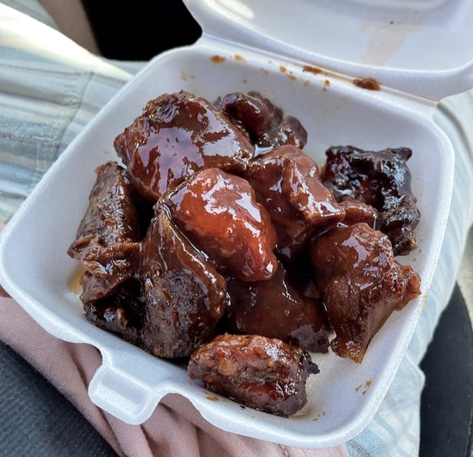 These saucy little morsels aren't just rib tips—they're bite-sized barbecue perfection that makes you wonder why anyone bothers with the full rib.