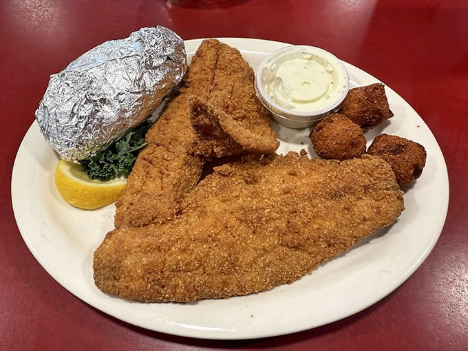 Crispy fried fish with hushpuppies—the kind of plate that makes you wonder why you ever bother with fancy restaurants.