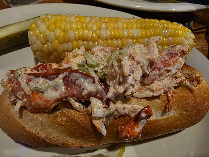 Lobster roll overflowing with chunky meat, served with sweet corn on the cob. New England vacation vibes without the six-hour drive.