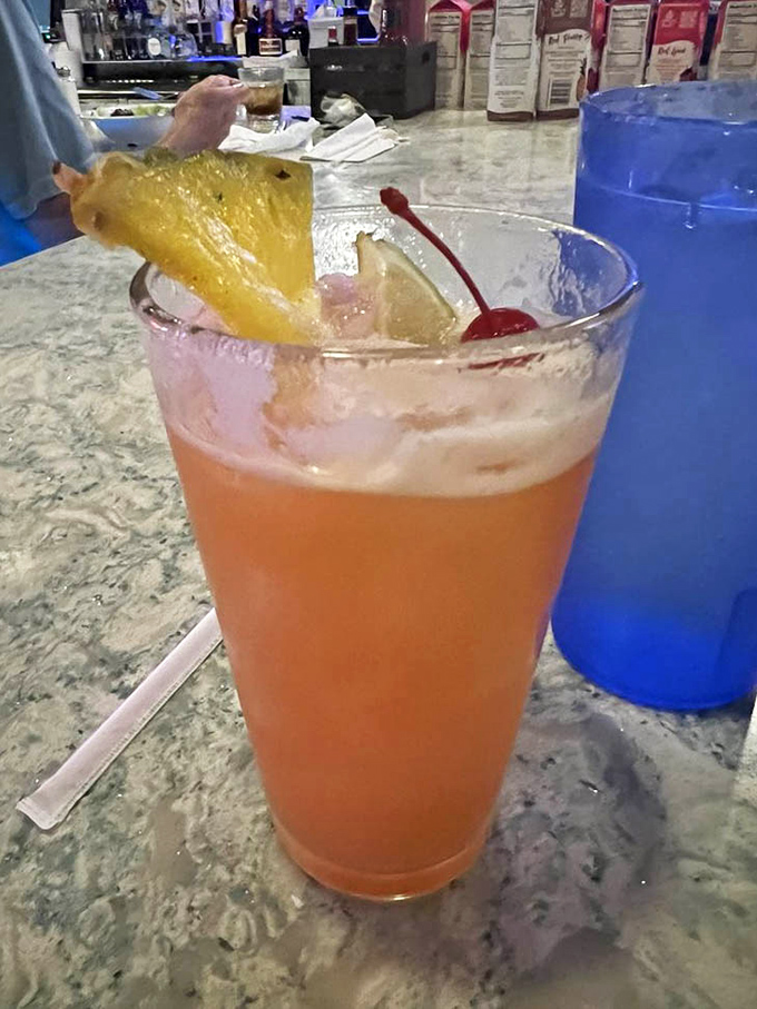A rum runner that's working overtime – part tropical vacation, part sunset in a glass. Florida in liquid form.