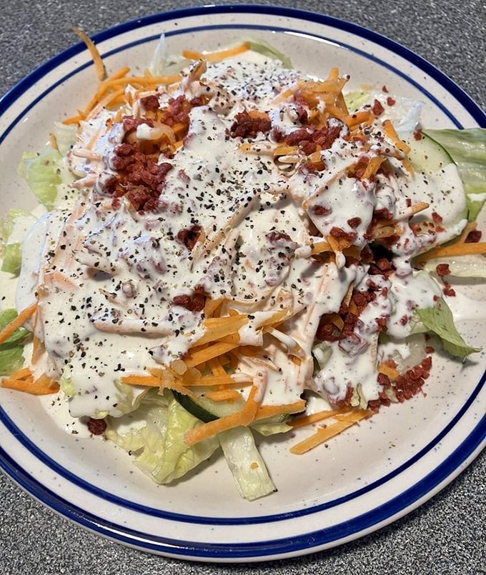 This salad has more toppings than lettuce—exactly how buffet salads should be when you're pretending to eat healthy.