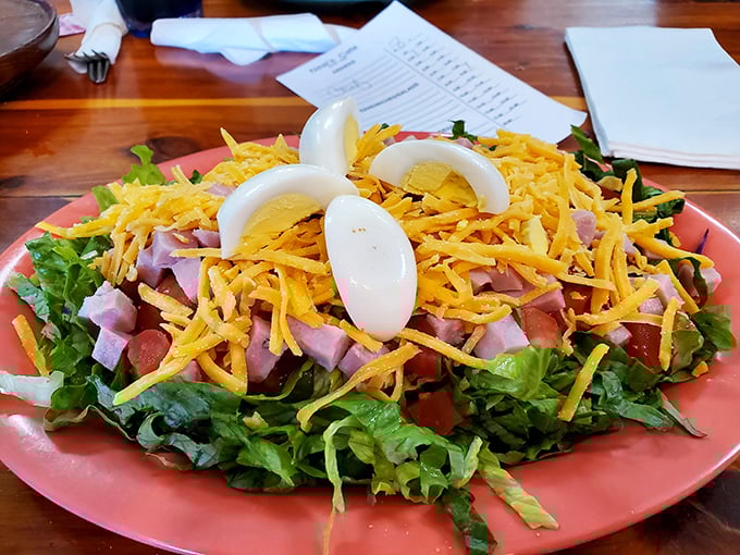 This chef's salad isn't trying to be fancy—just honest-to-goodness fresh ingredients piled high with ham, cheese, and hard-boiled eggs. Simple perfection!