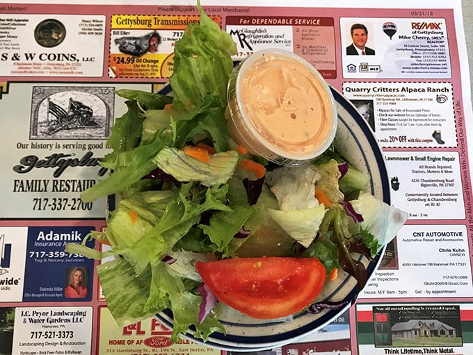 A garden-fresh salad served on their signature placemat-menus – a lighter option that doesn't sacrifice flavor. Sometimes virtue tastes pretty darn good.